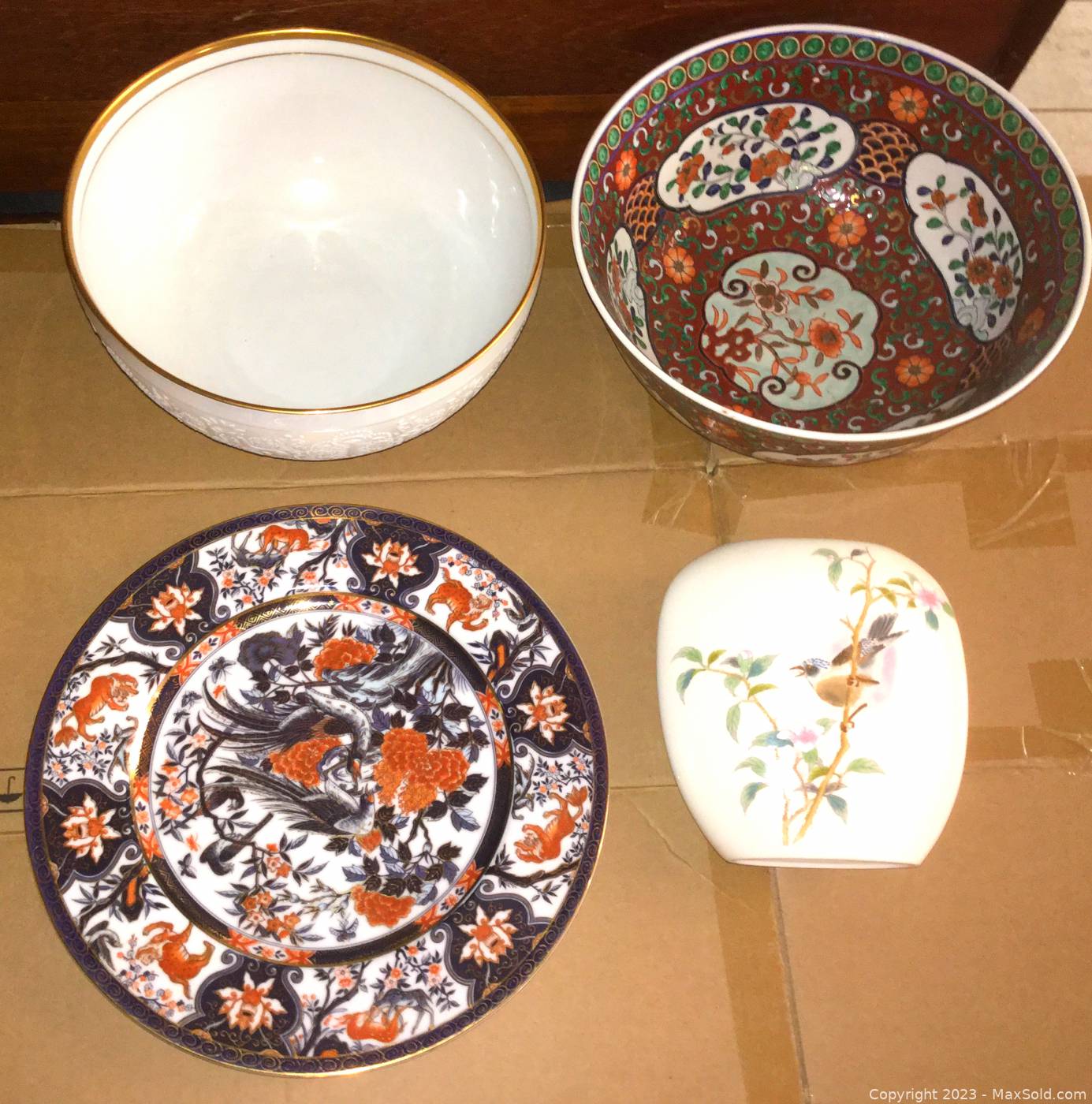 Vintage Pottery and Vase Collection with Decorative Plates | Maxsold