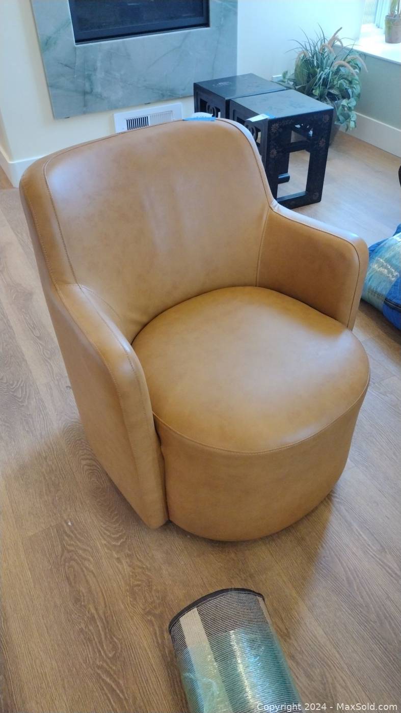 Compact Swivel Bucket Chair by Haining Degao Home Furnishings | Maxsold