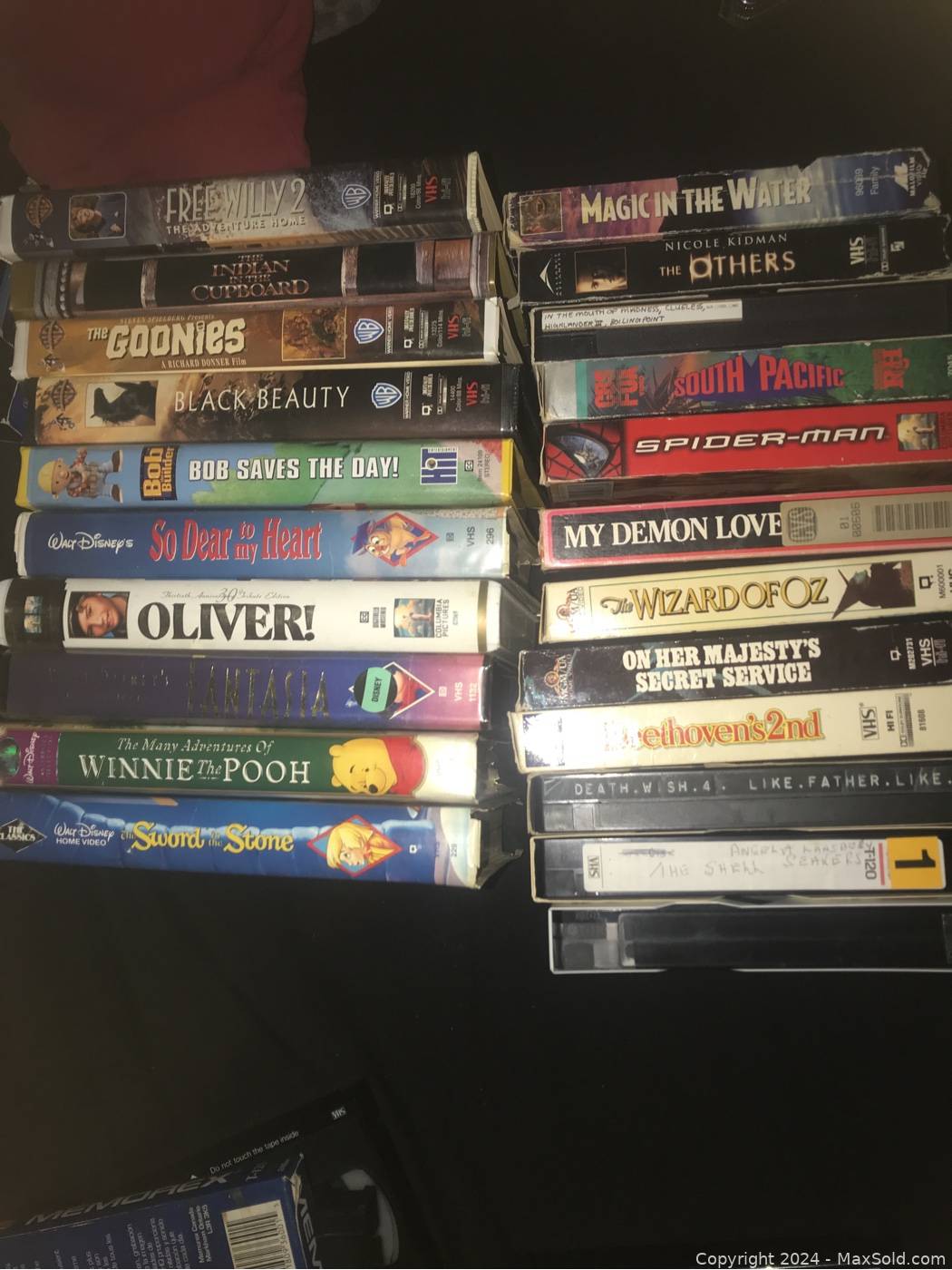 Collection of Various VHS Tapes Including Movies and Animated Titles ...