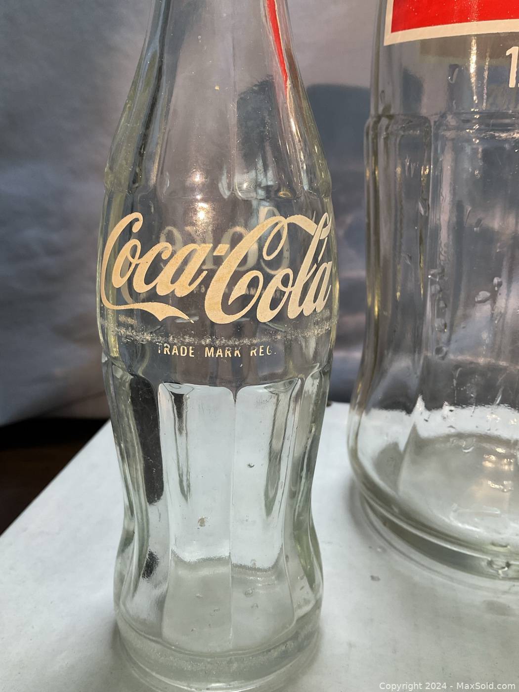 3 Sizes of Vintage Coca-Cola Bottles | Maxsold