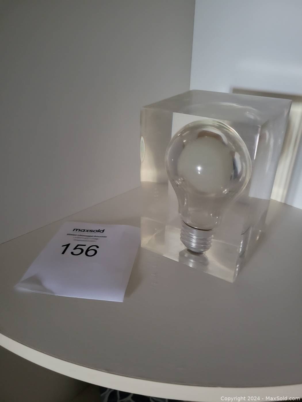Vintage 1970s Glow-in-the-Dark Light Bulb in Lucite Block | Maxsold