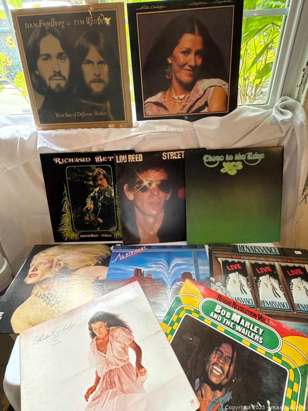 Vinyl records Dan Fogelberg, Lou Reed, Bob Marley and others | Maxsold