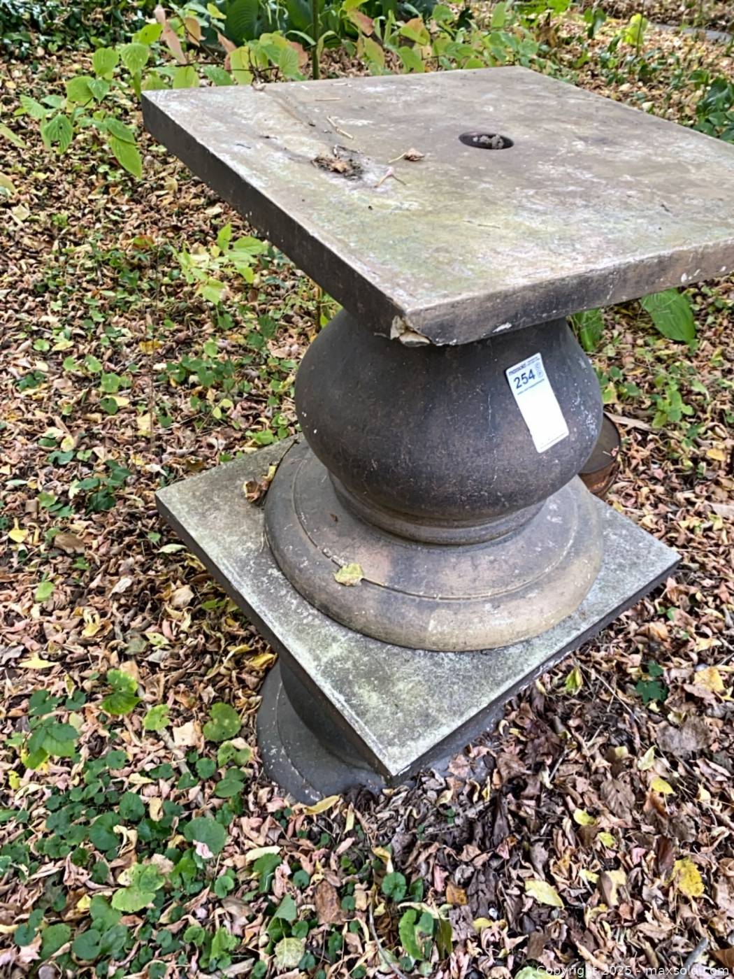 Pair heavy cast stone umbrella stands | Maxsold