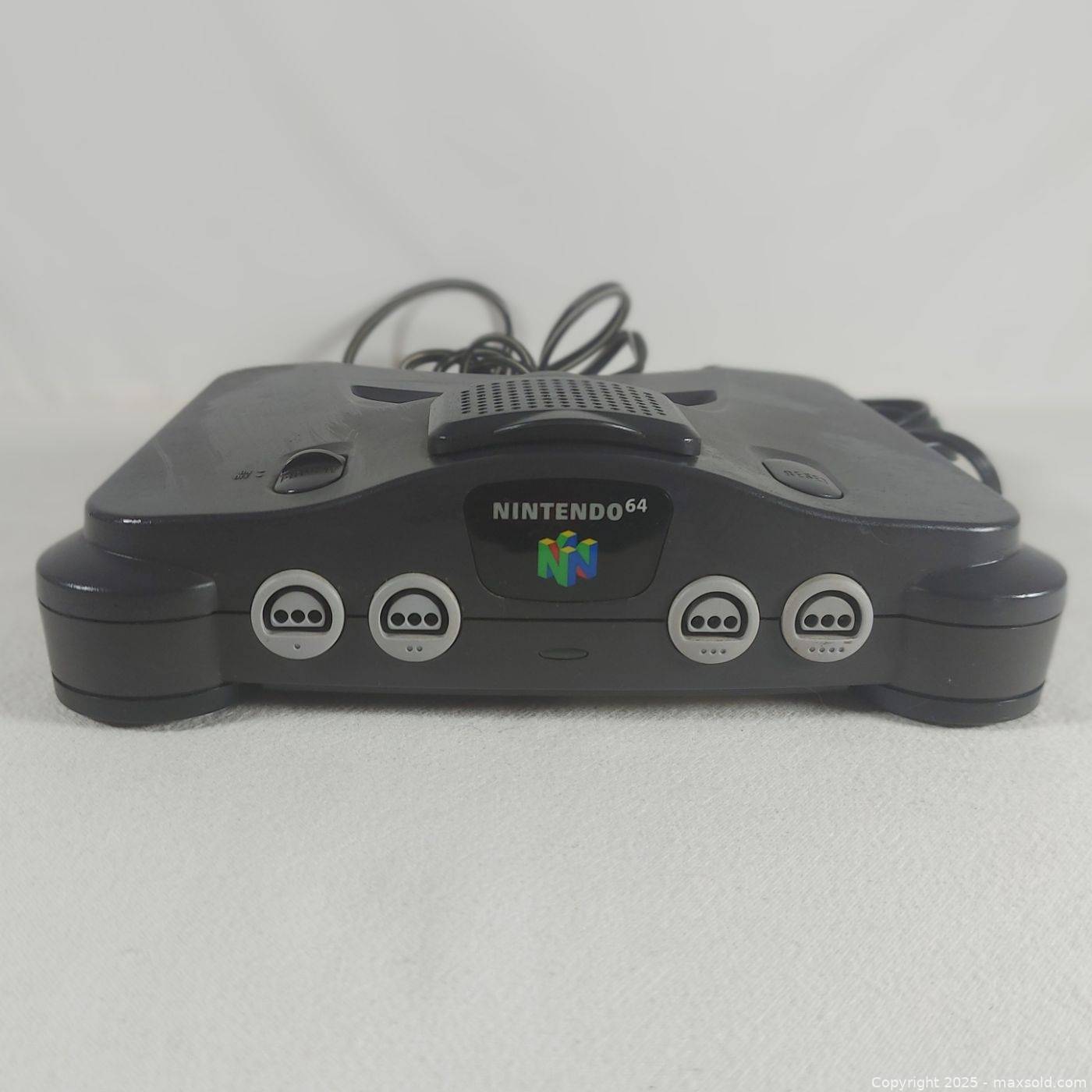 1996 Nintendo 64 video game console with power and AV cables | Maxsold