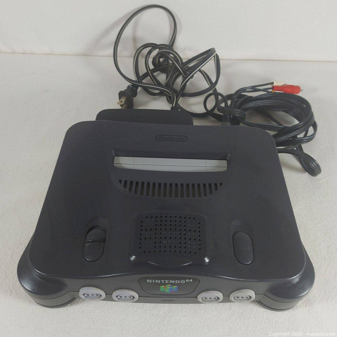1996 Nintendo 64 video game console with power and AV cables | Maxsold