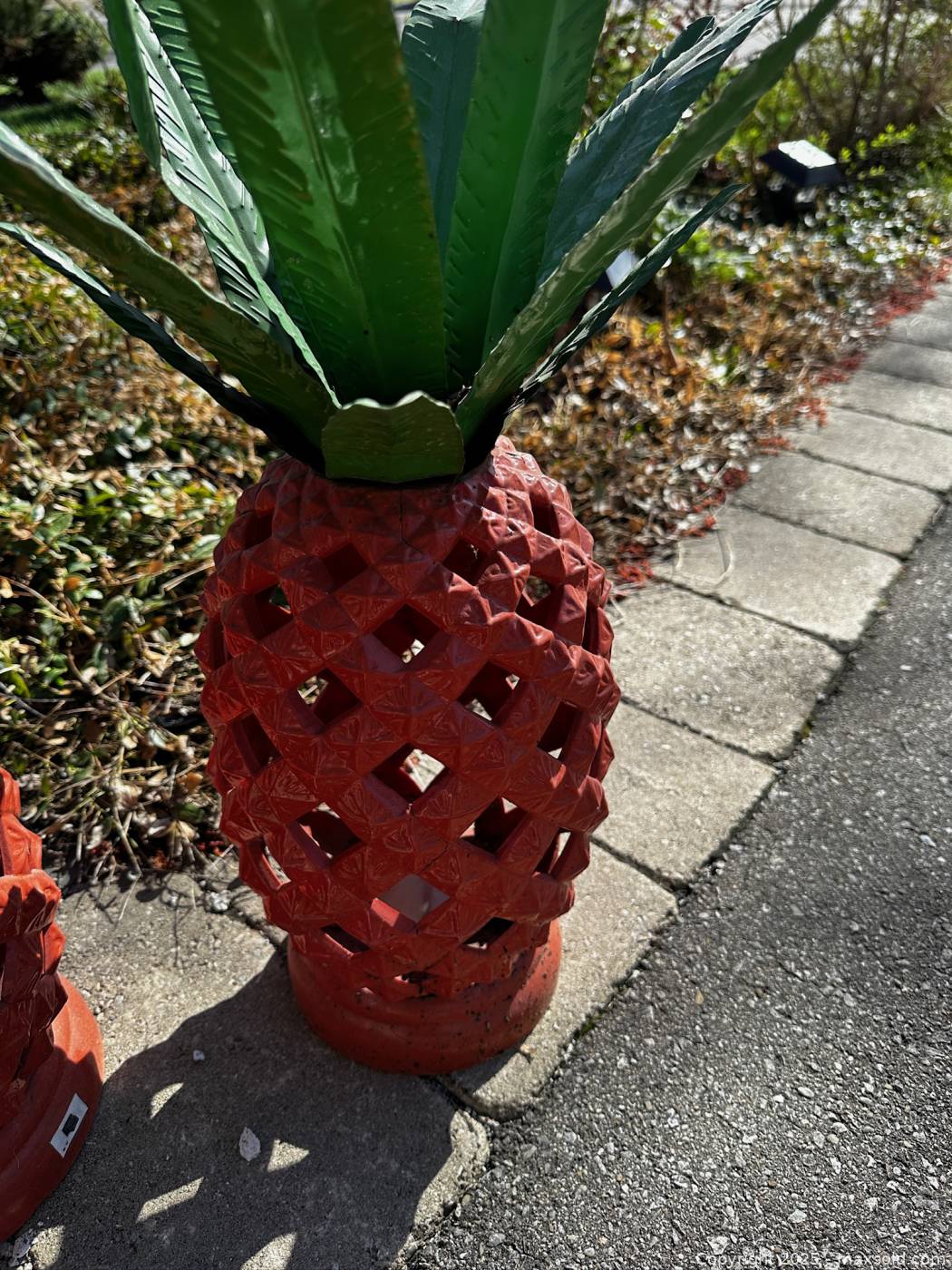 Two Decorative Outdoor Pineapple Sculptures | Maxsold