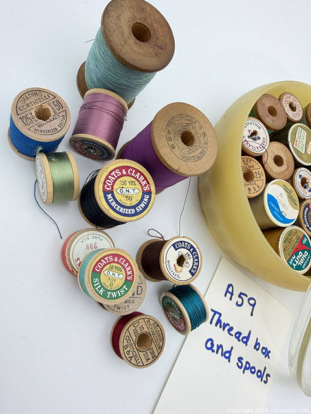 Vintage thread box with wooden spools | Maxsold