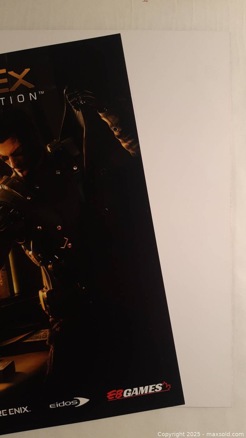 Deus Ex: Human Revolution cover art copies x2 | Maxsold