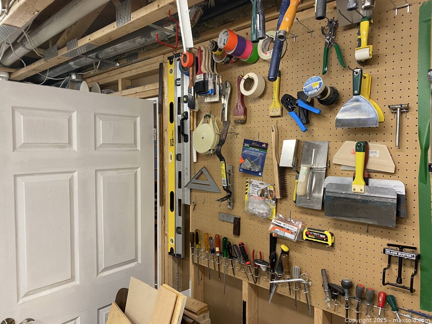 Workshop Wall of Tools Collection with Rulers, Screwdrivers, Rollers ...