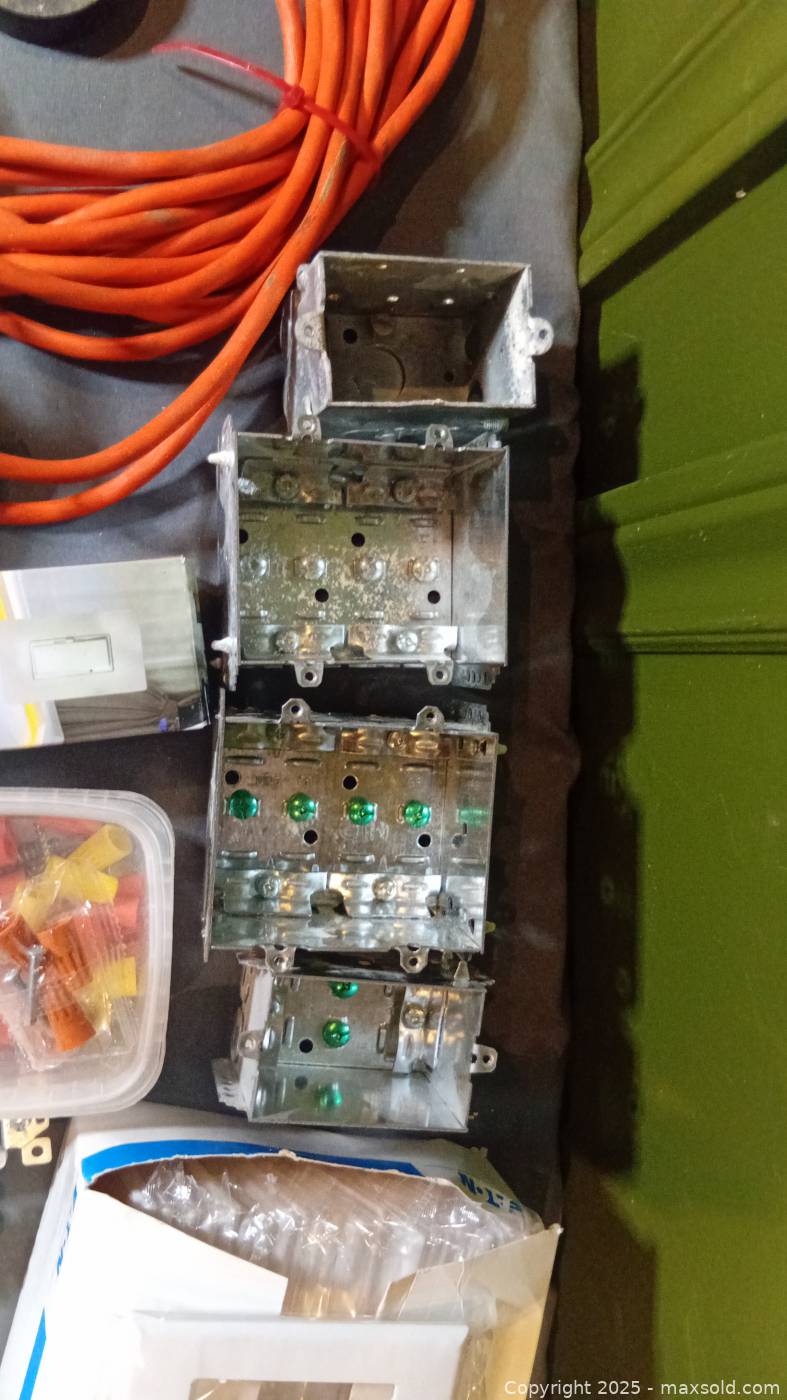Electrical Lot with Extension Cord, Plates, Boxes, and Wire Nuts | Maxsold