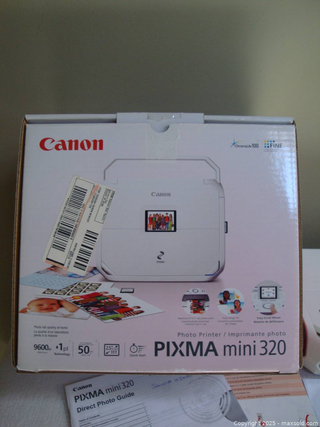 Canon Pixma mini 320 Photo Printer with Accessories | Maxsold