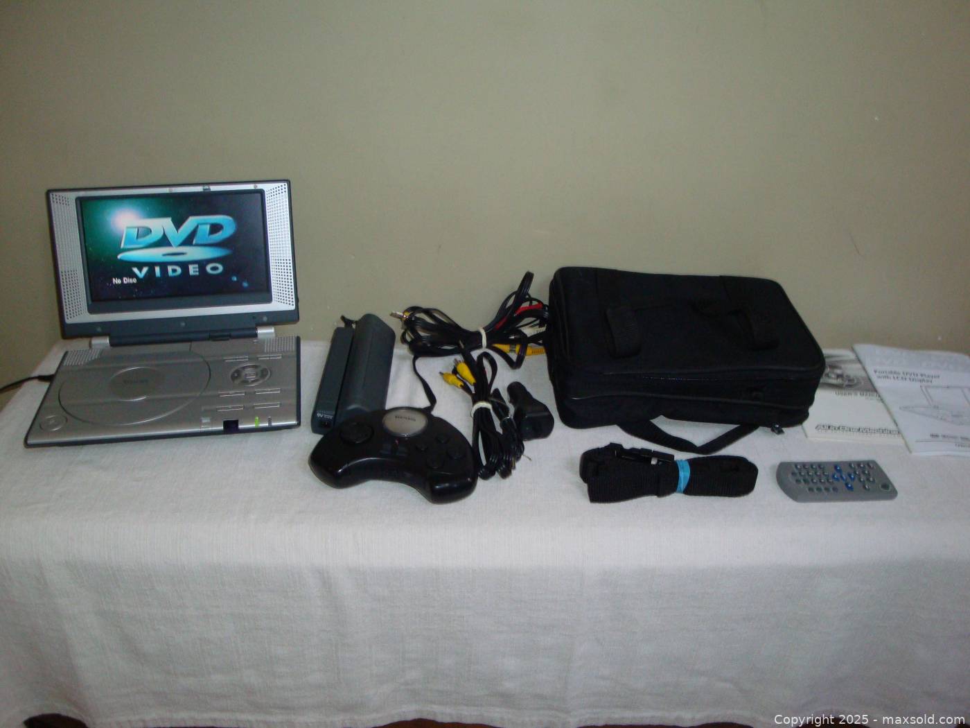 Venturer PVS1080G Portable DVD Player with Accessories | Maxsold