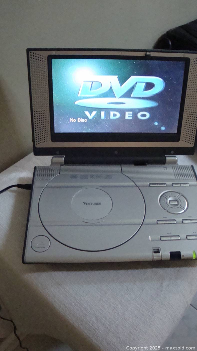 Venturer PVS1080G Portable DVD Player with Accessories | Maxsold