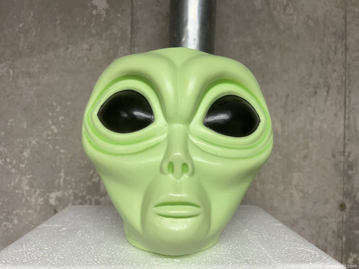 Lime Green Plastic Alien Head, 15 in | Maxsold