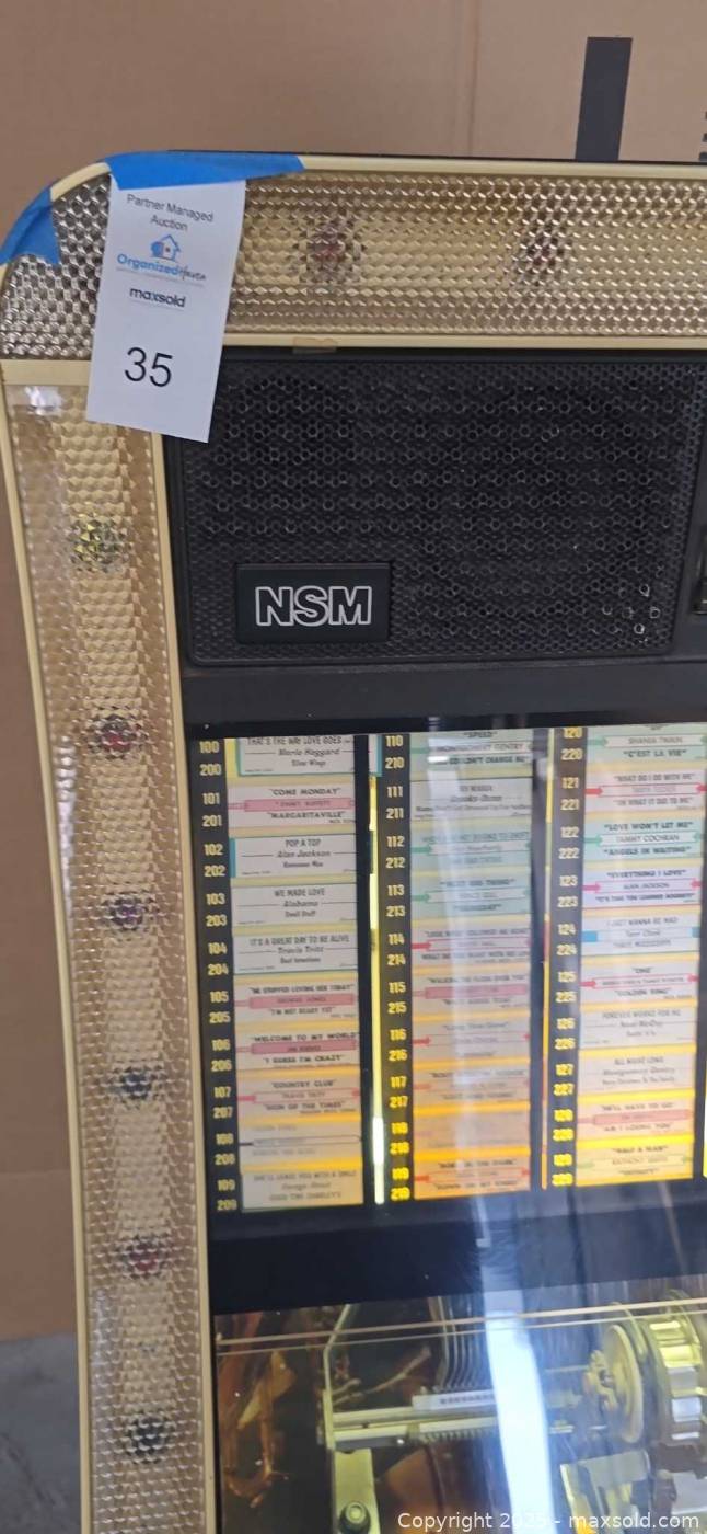 NSM Prestige II 45 RPM vinyl jukebox with approx. 80 records | Maxsold