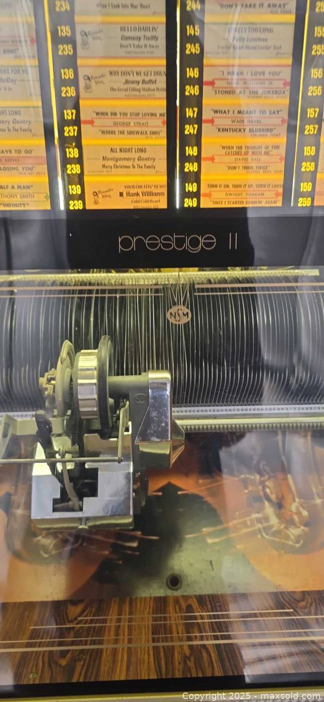 NSM Prestige II 45 RPM vinyl jukebox with approx. 80 records | Maxsold