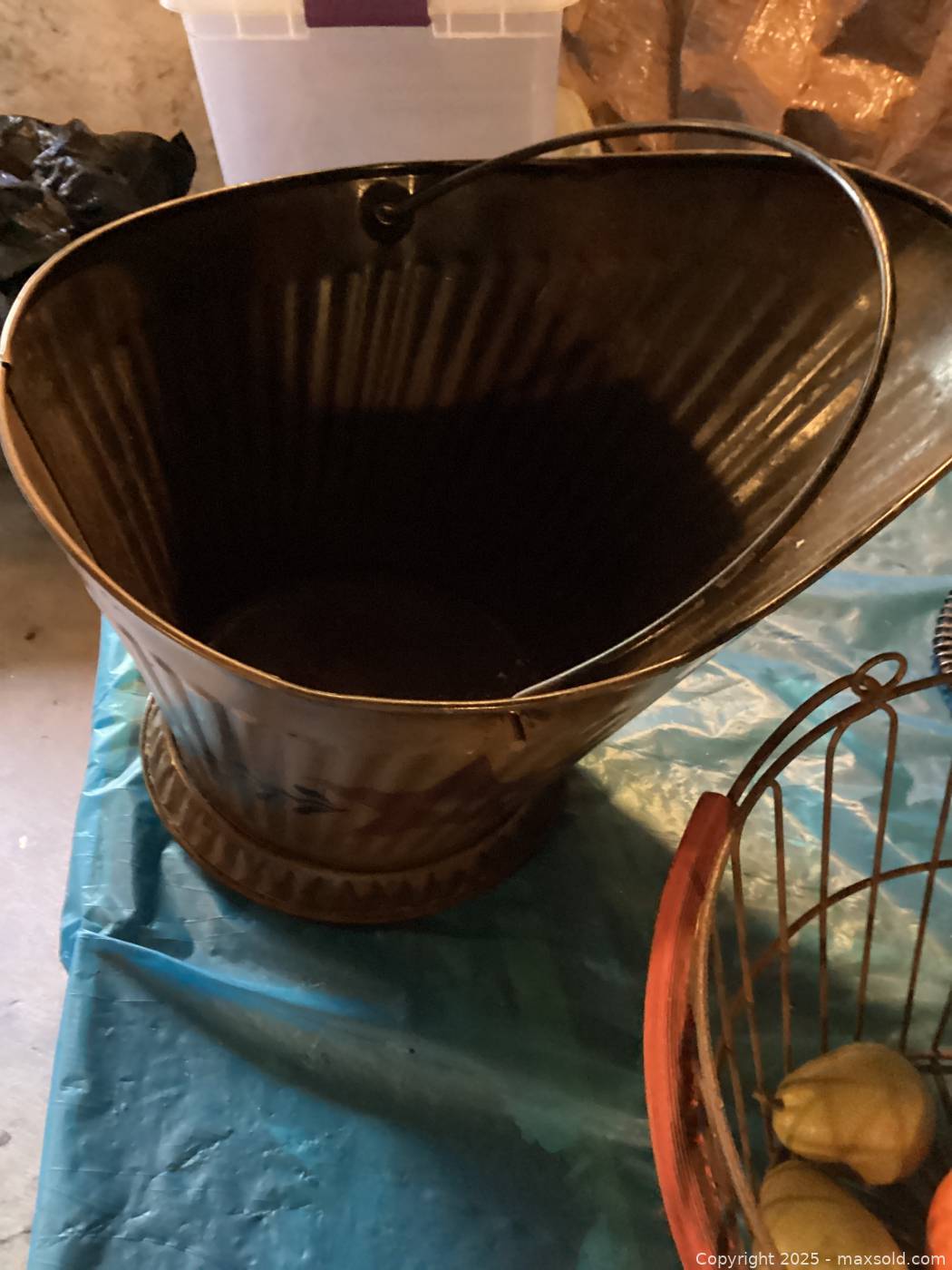 Vintage tin bucket, wire plant holder, and egg basket | Maxsold
