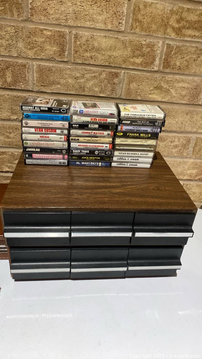 27 Music Cassettes With Storage Units | Maxsold