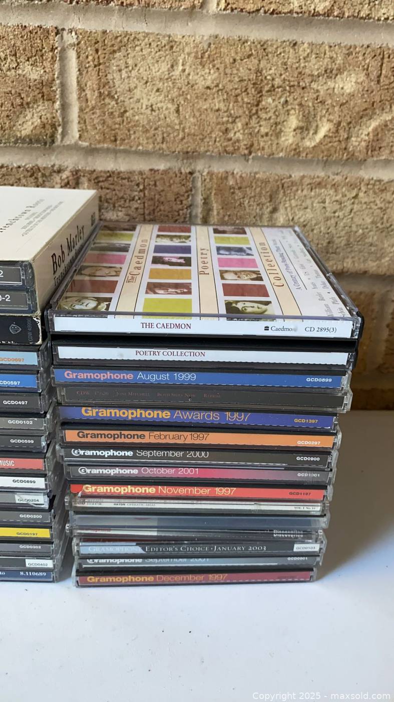 28 mixed music and spoken-word CDs | Maxsold