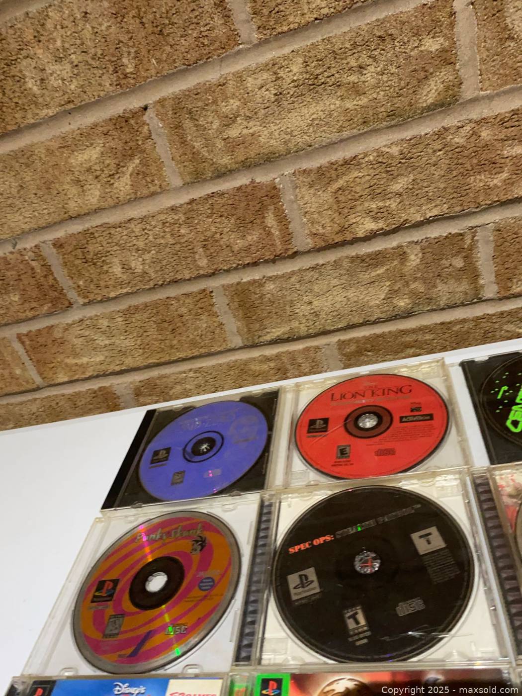 Sony PlayStation 1 game discs and cases, 13 total | Maxsold