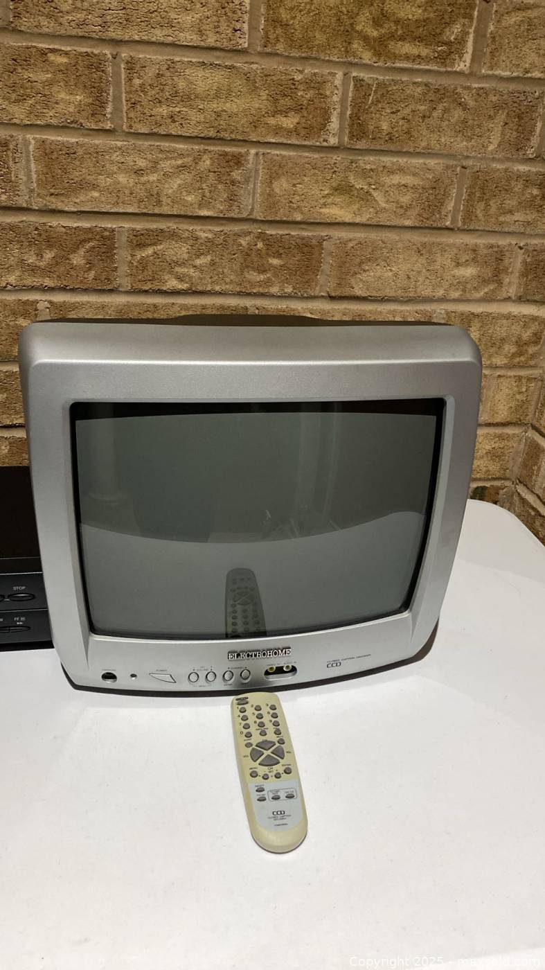 Sharp VC-H960 VCR, 13-inch Electrohome TV, Remote | Maxsold