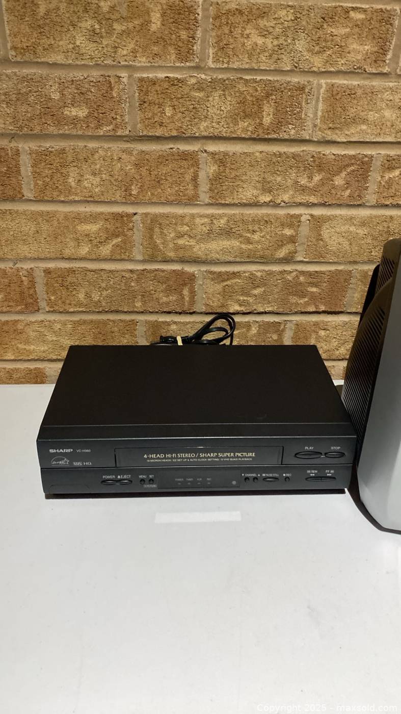 Sharp VC-H960 VCR, 13-inch Electrohome TV, Remote | Maxsold
