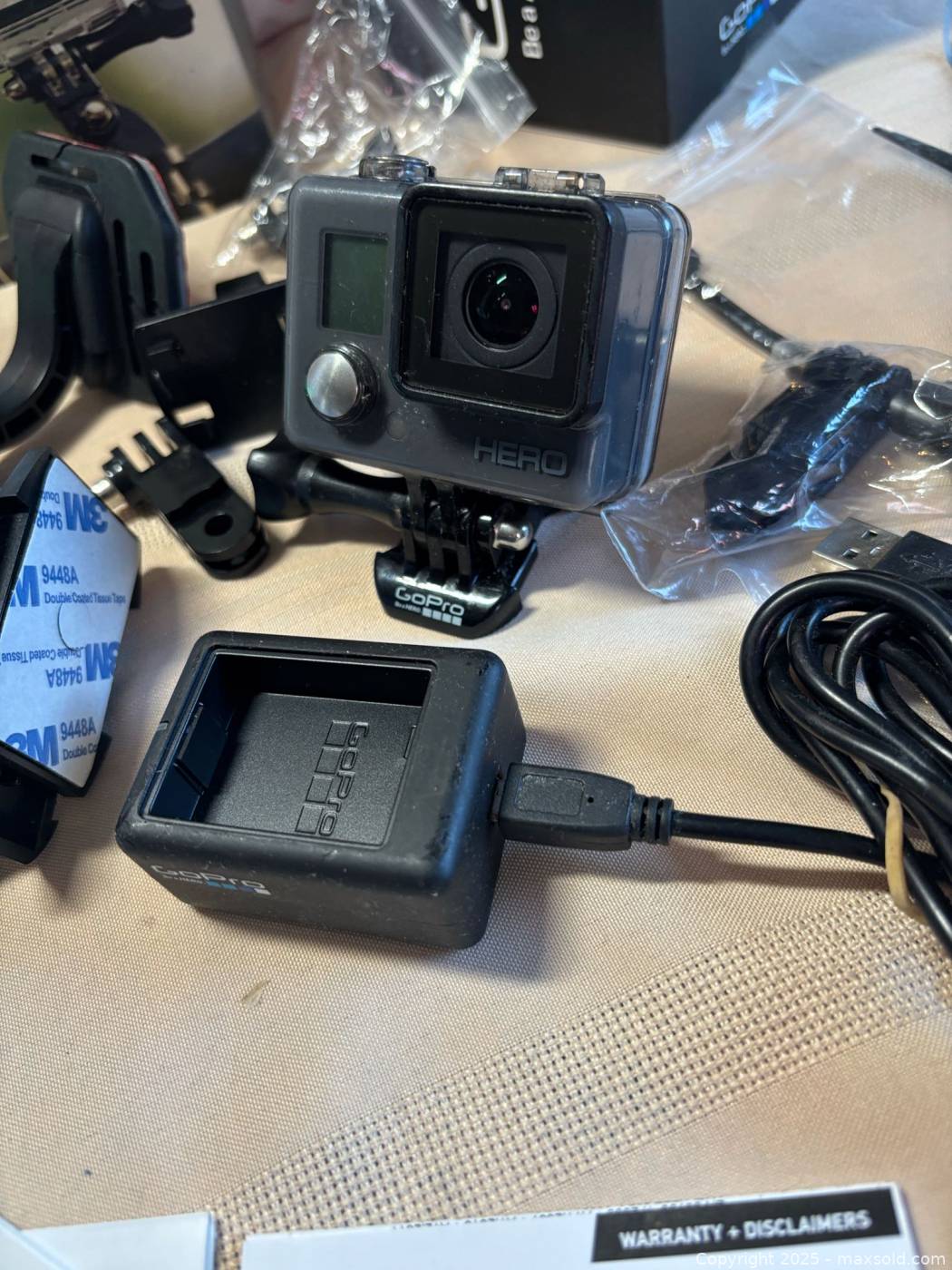 GoPro Hero action camera with accessories | Maxsold