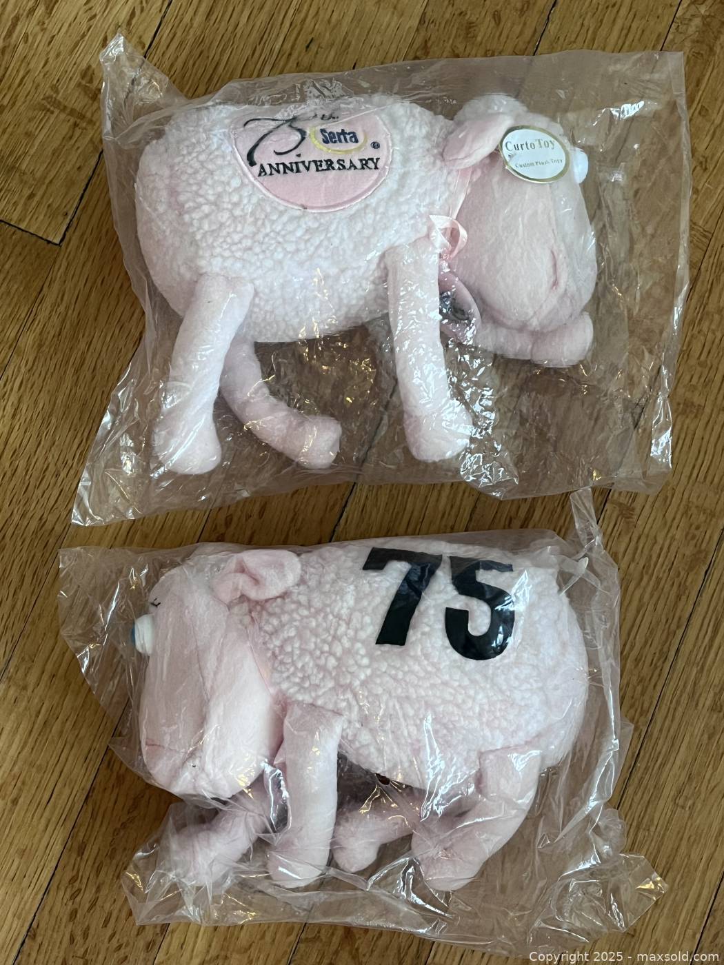 Serta 75th Anniversary plush sheep toys | Maxsold