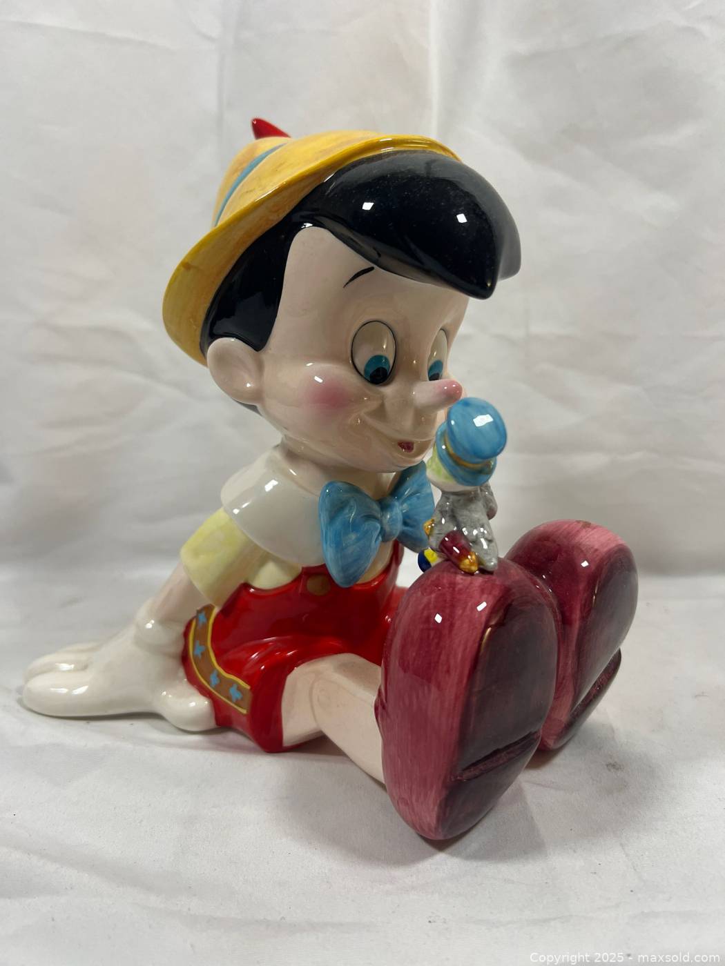 Schmid Pinocchio ceramic music box | Maxsold