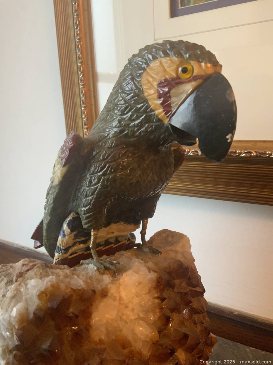 Carved semi-precious stone parrot on amethyst base | Maxsold