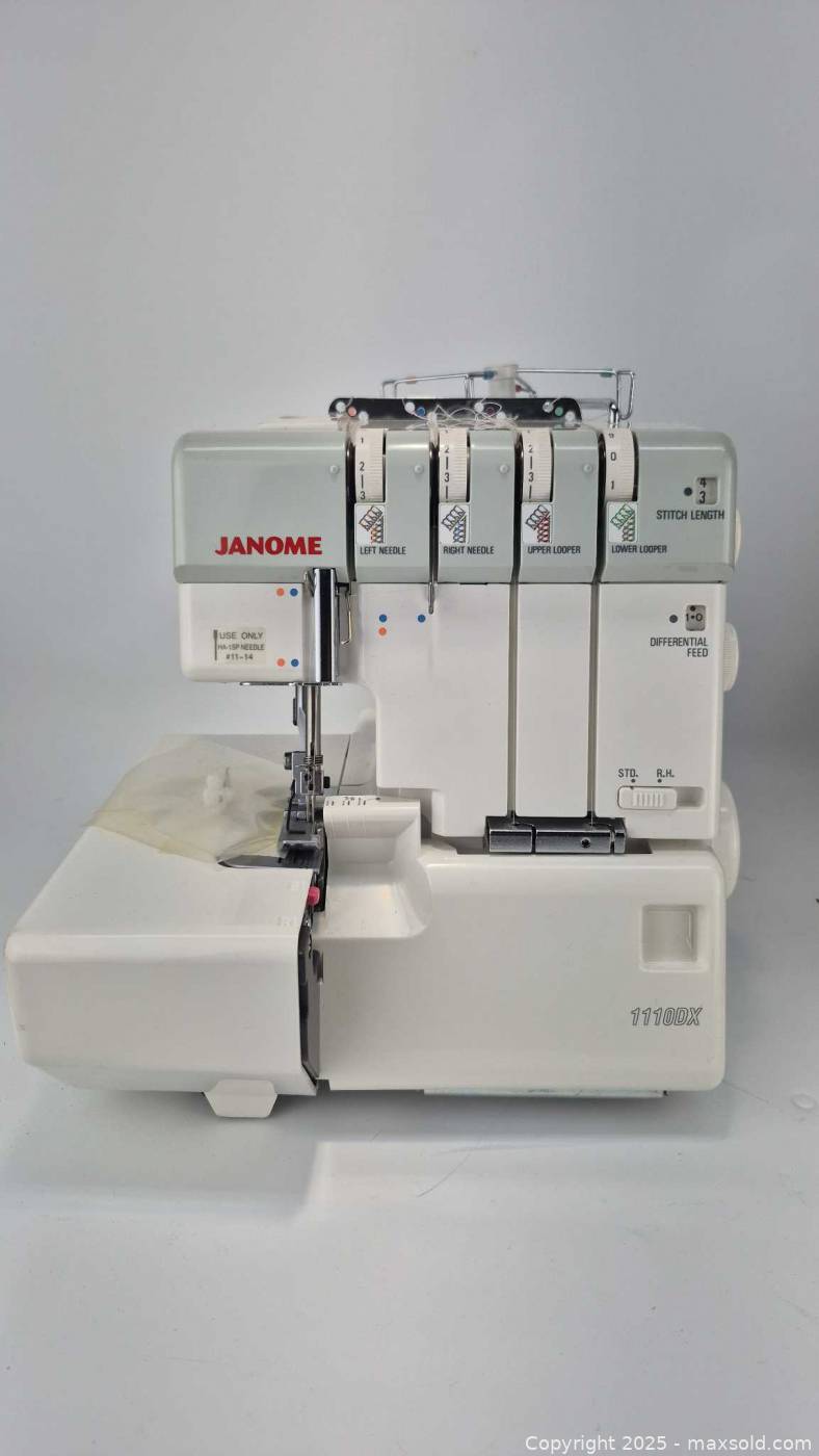 Janome 1110DX Serger Overlock Sewing Machine with Accessories | Maxsold