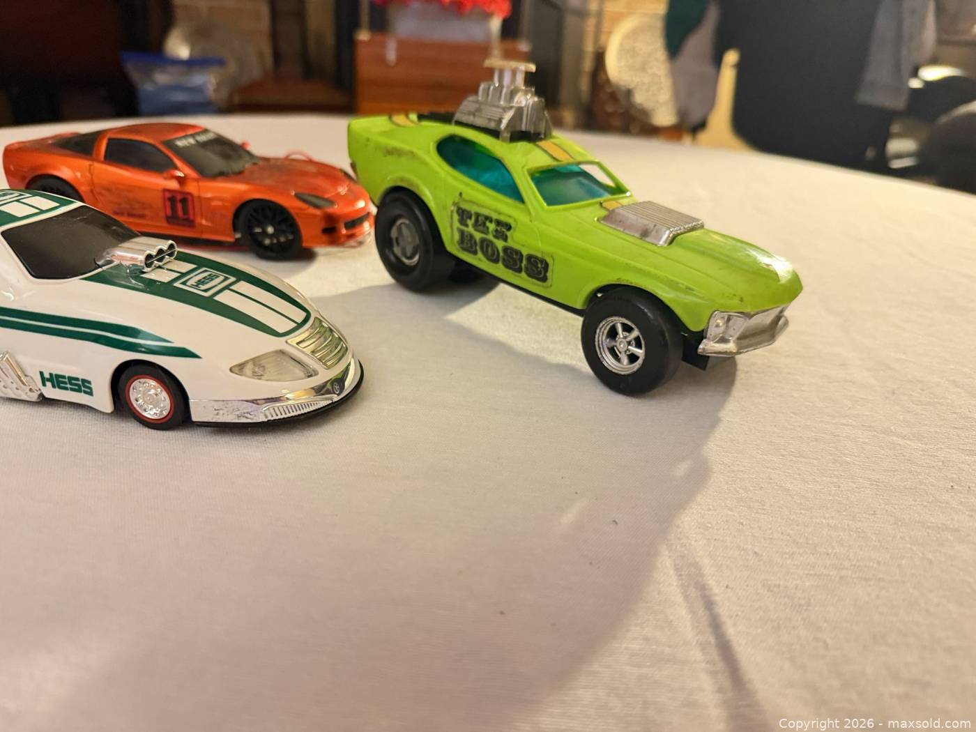 Three 6-inch toy cars | Maxsold