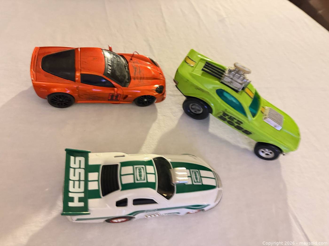 Three 6-inch toy cars | Maxsold
