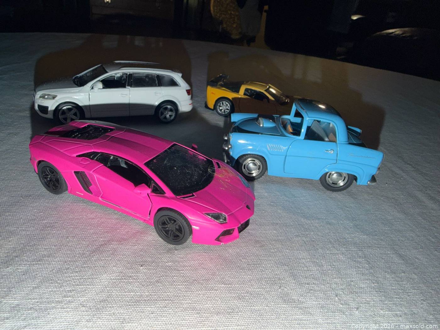 4 die-cast toy vehicles, ~4 in. | Maxsold