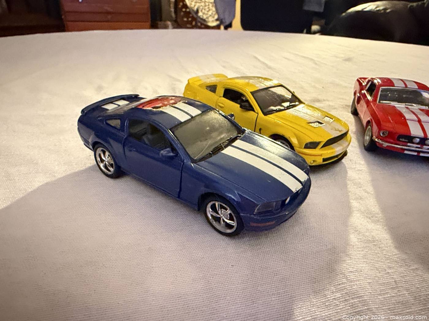 Lot of 4 Ford Mustang toy cars | Maxsold