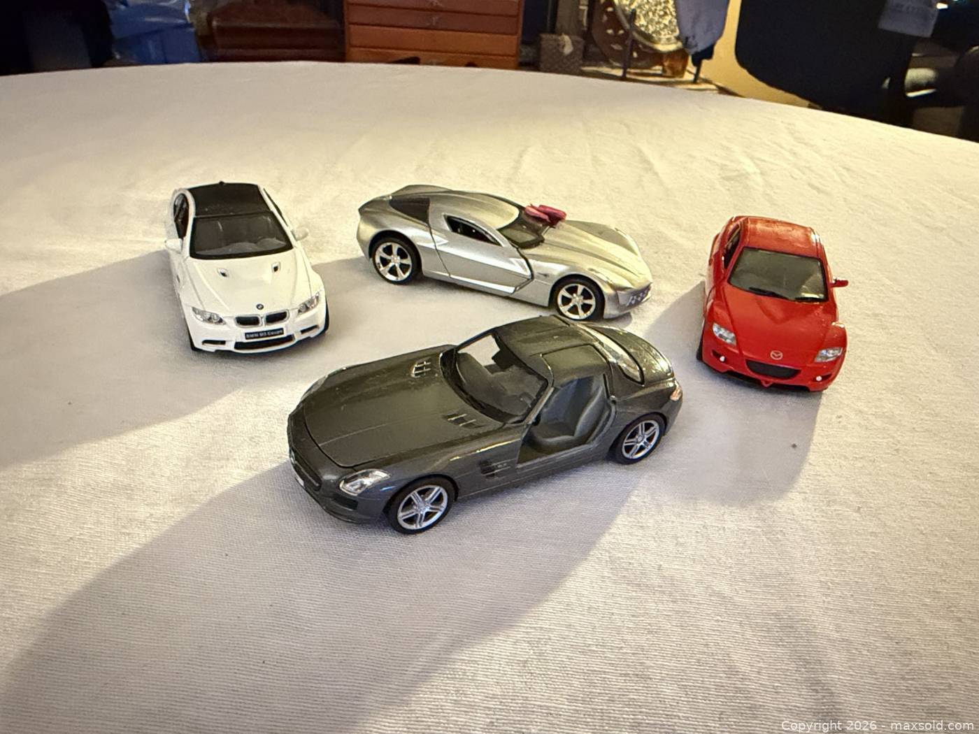 4 toy sports car vehicles | Maxsold