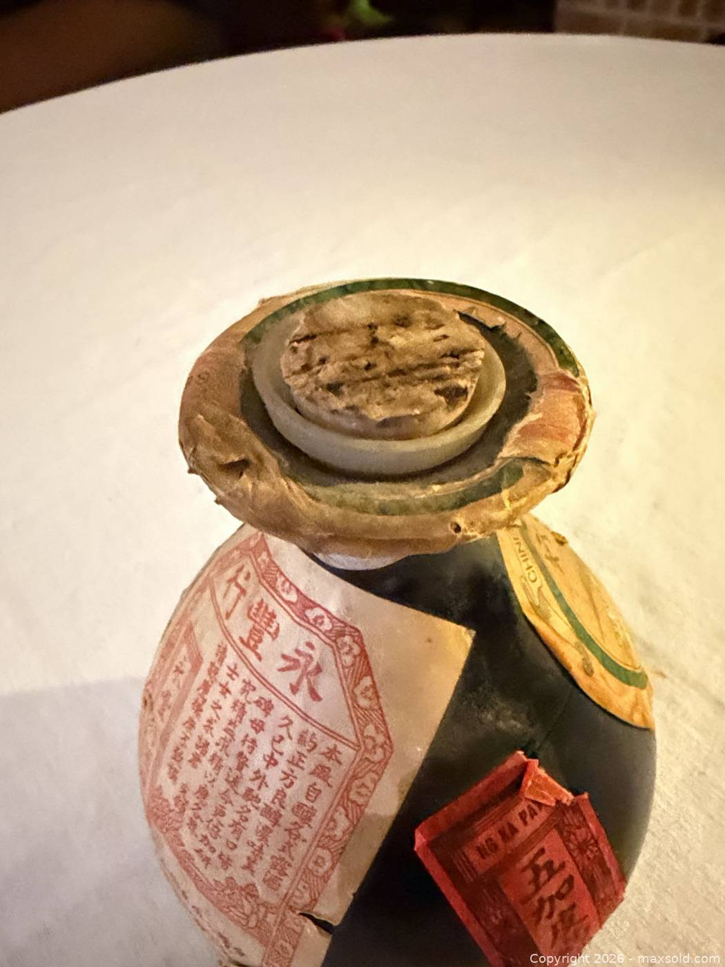 Vintage Wing Fung Hong 84-proof ceramic liquor bottle | Maxsold