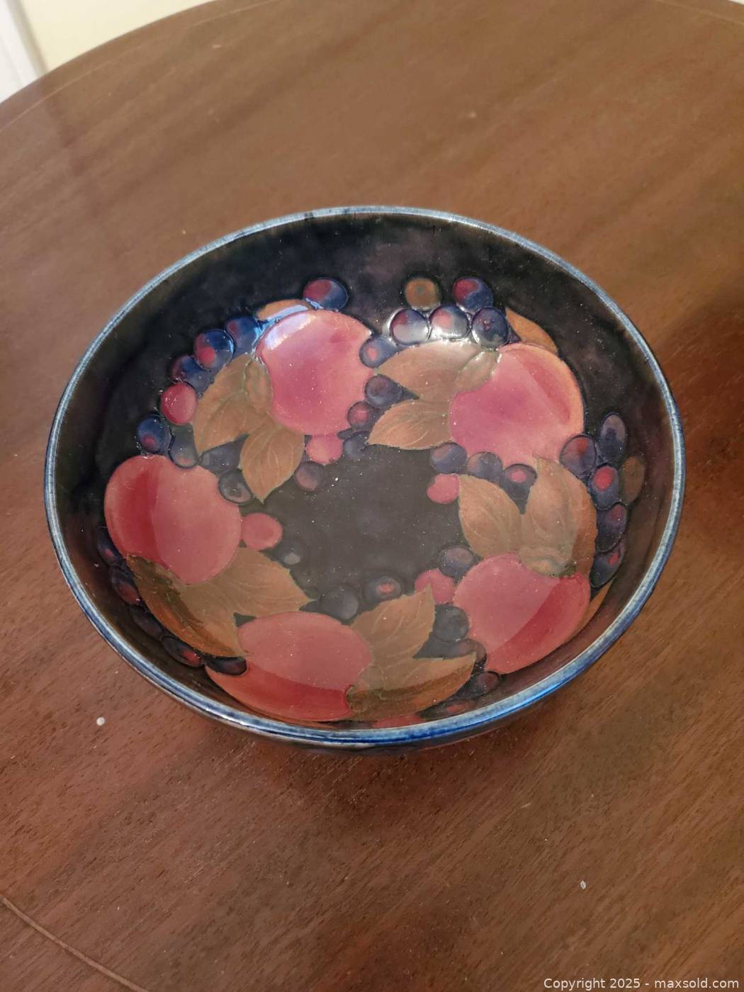 Moorcroft fruit pattern footed bowl | Maxsold