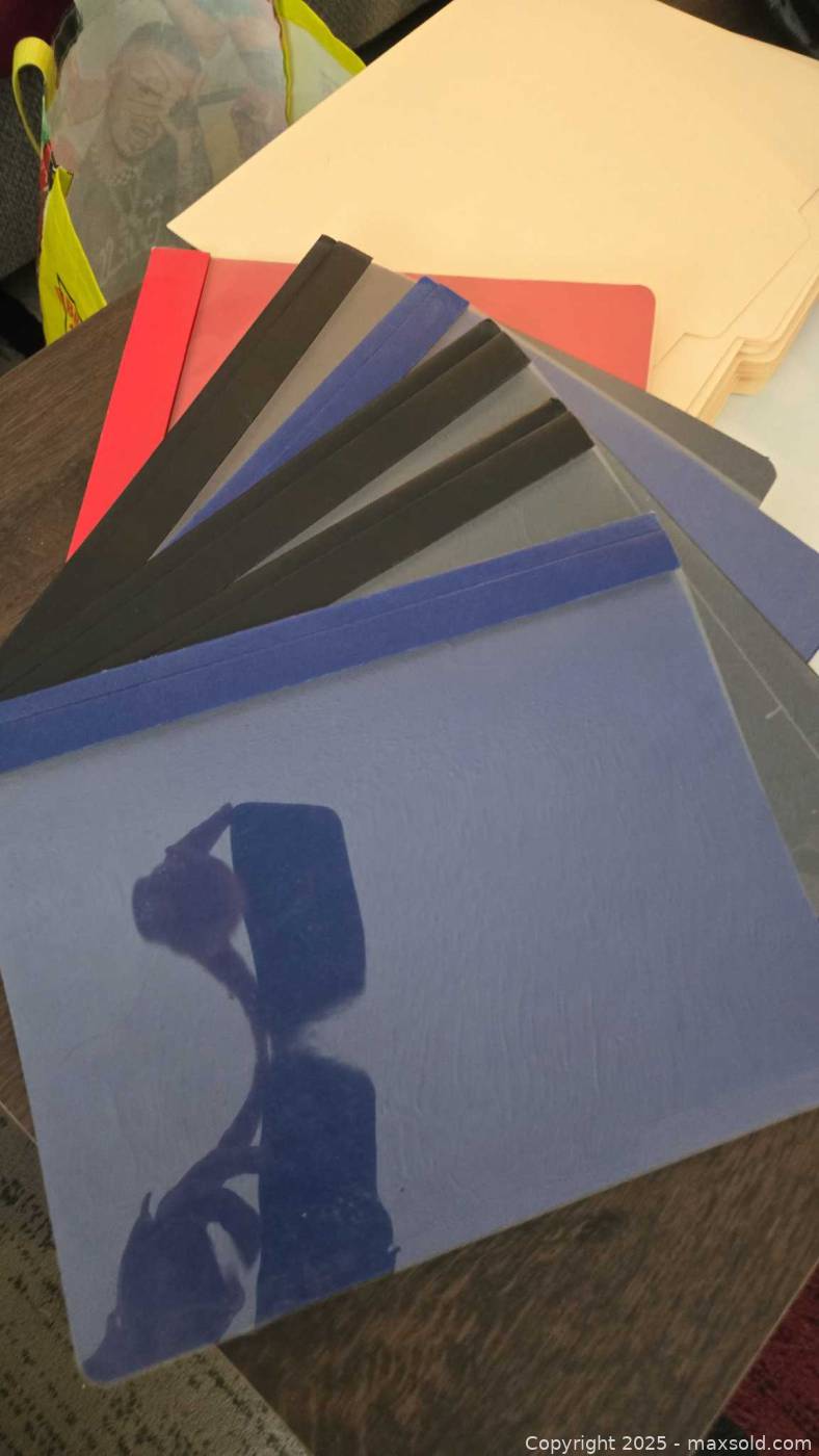 Assorted binders, folders, whiteboard | Maxsold