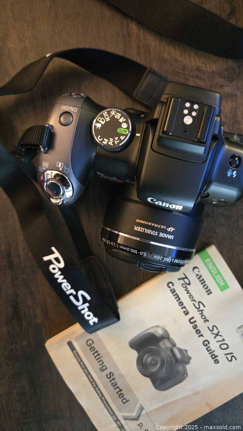 Canon PowerShot SX710 IS digital camera with accessories | Maxsold