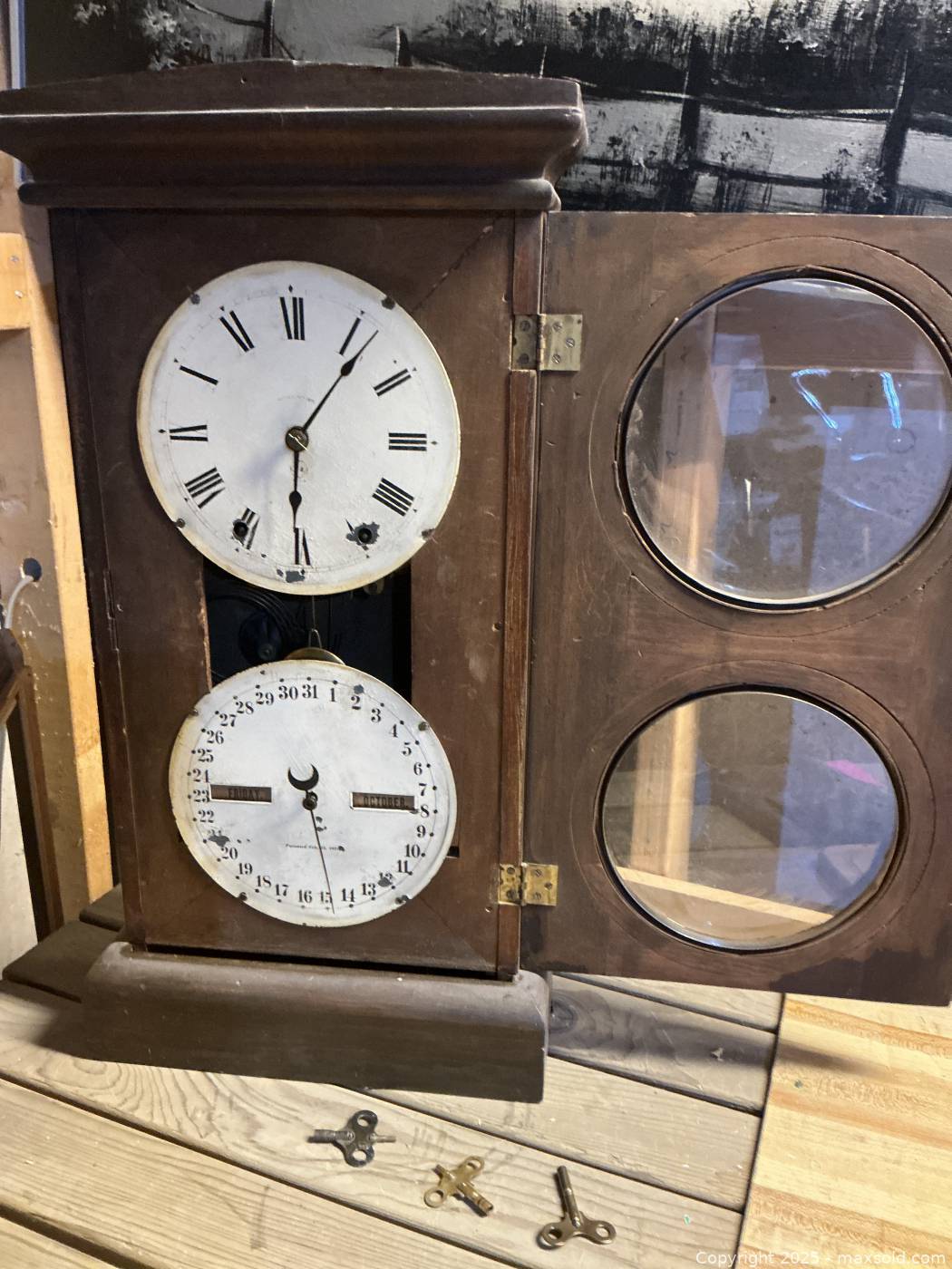 Wooden double dial mantel clock with keys | Maxsold