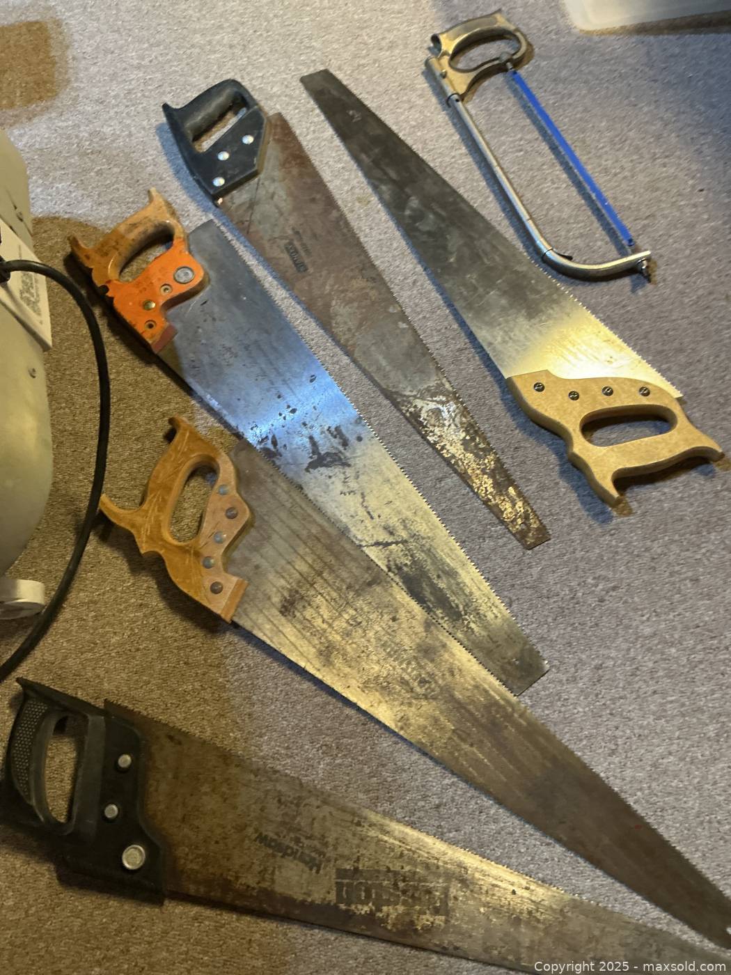 Six assorted hand saws and hacksaw | Maxsold