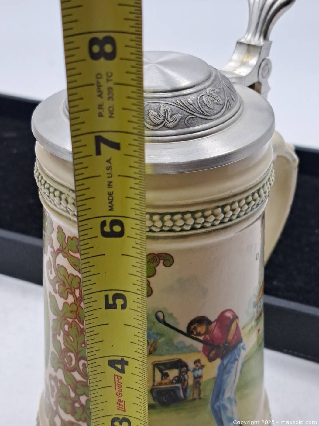Vintage golf-themed ceramic beer stein | Maxsold