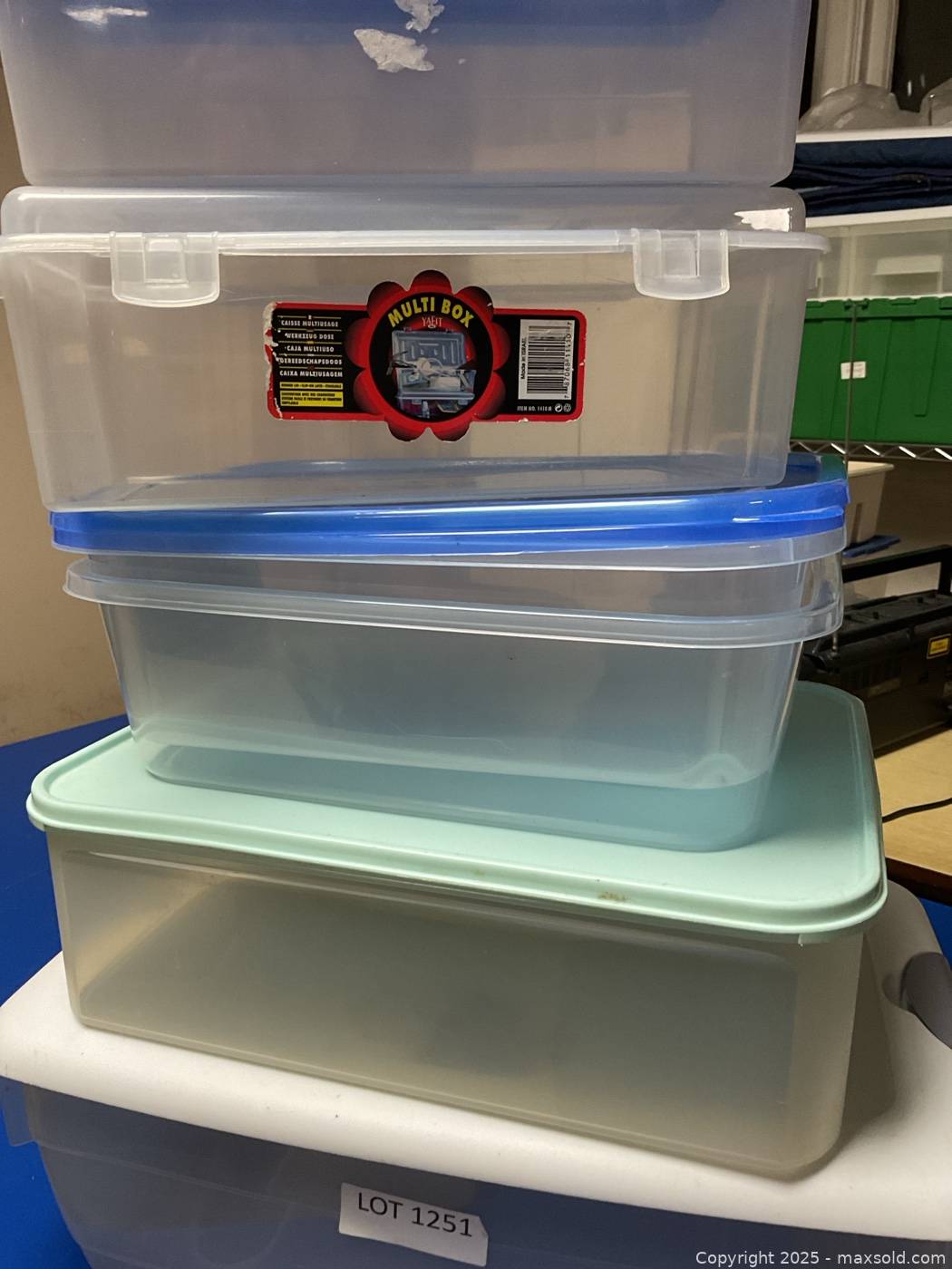 Assorted plastic storage bins with lids | Maxsold