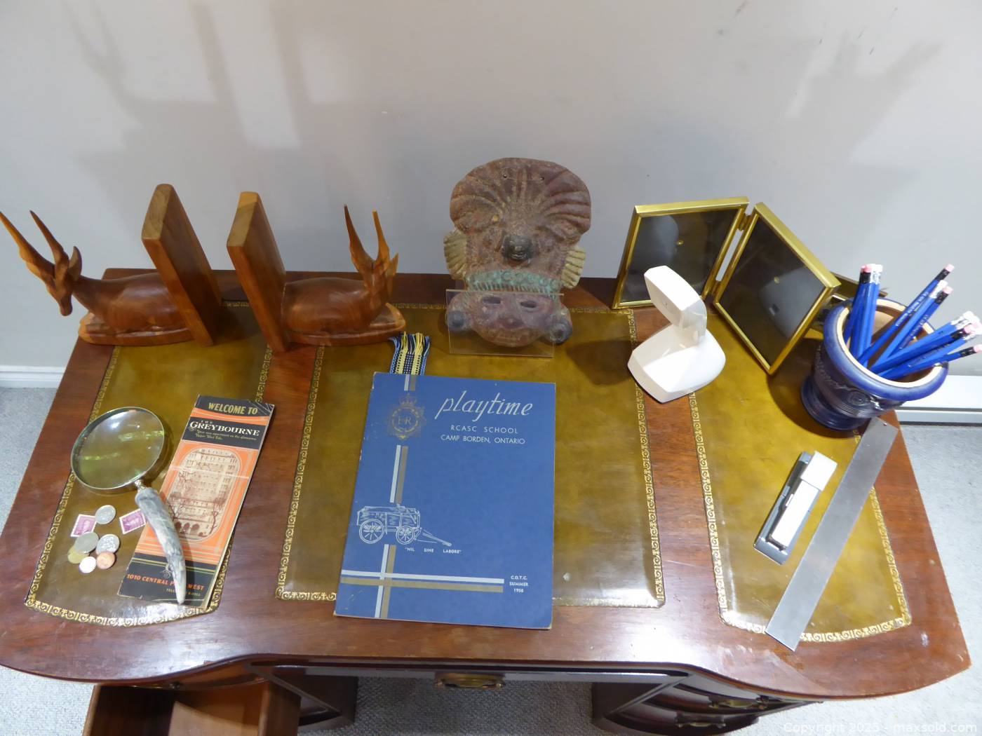 Pedestal desk with assorted desk items | Maxsold
