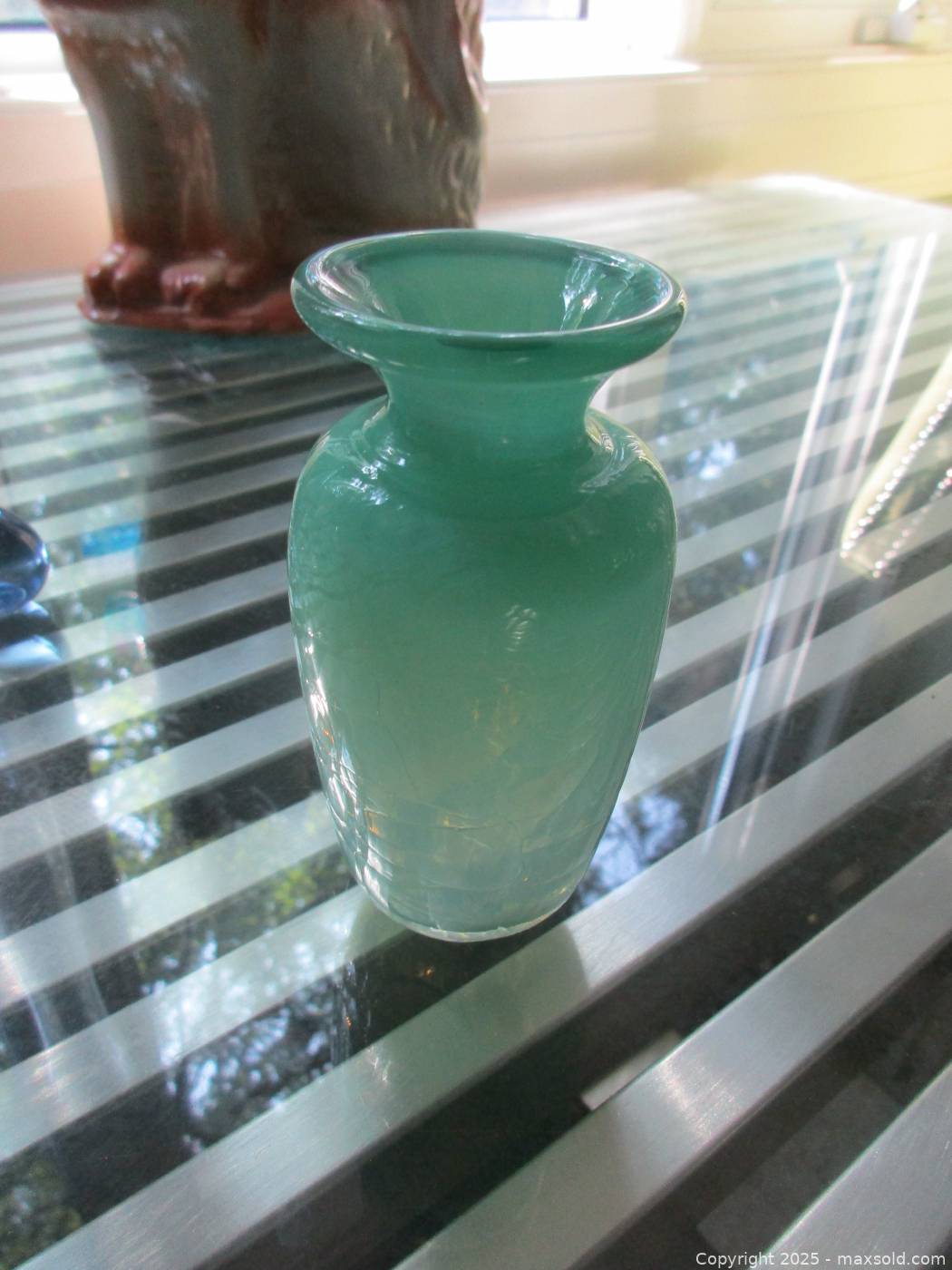 Assorted coloured glass vases & dolphin figurine | Maxsold