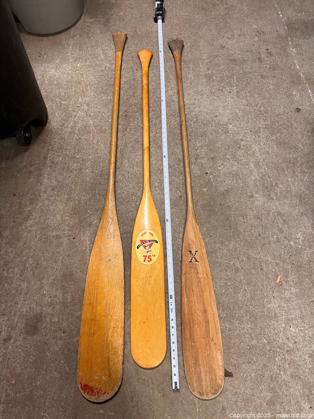 Three wooden canoe paddles, assorted lengths | Maxsold