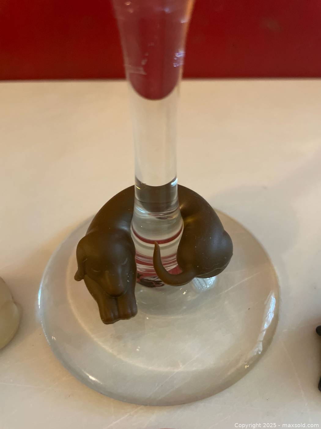 Wine glass and six silicone dog markers | Maxsold