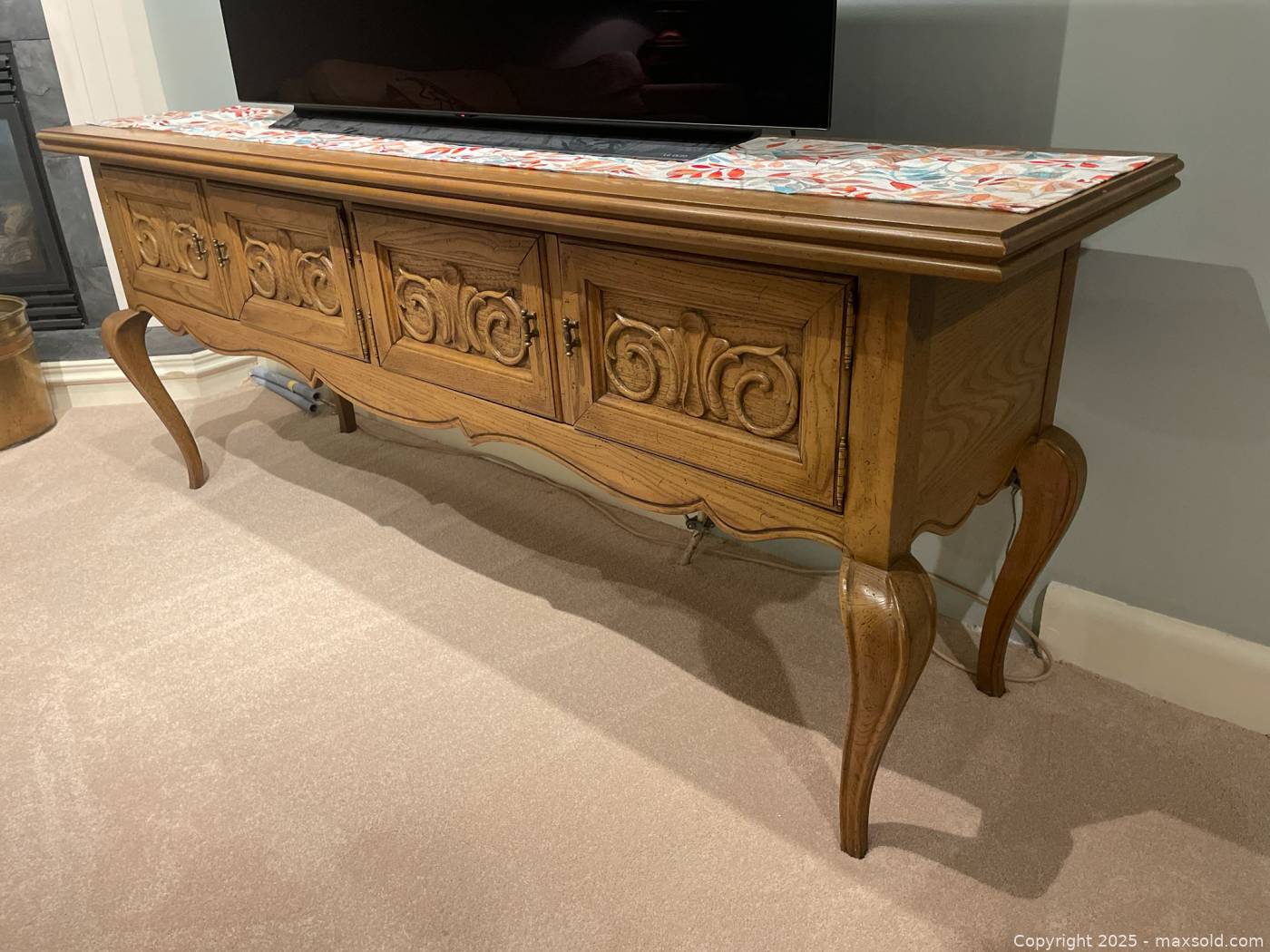 French Provincial hardwood buffet TV stand | Maxsold