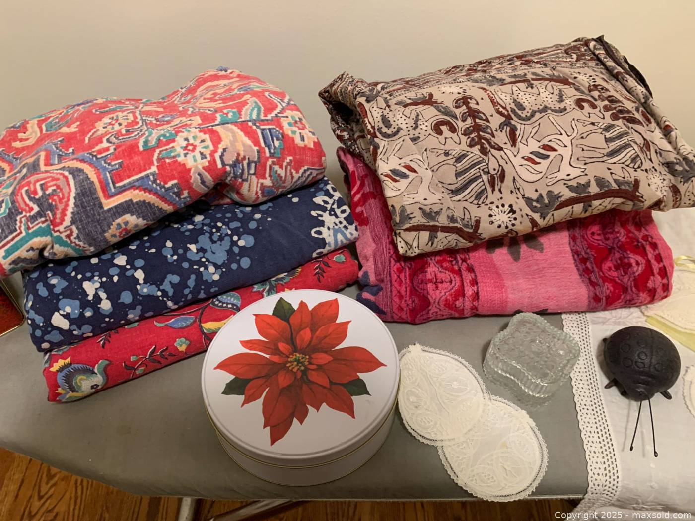 Proctor Silex ironing board, lace linens, Indian throws, cookie tins ...